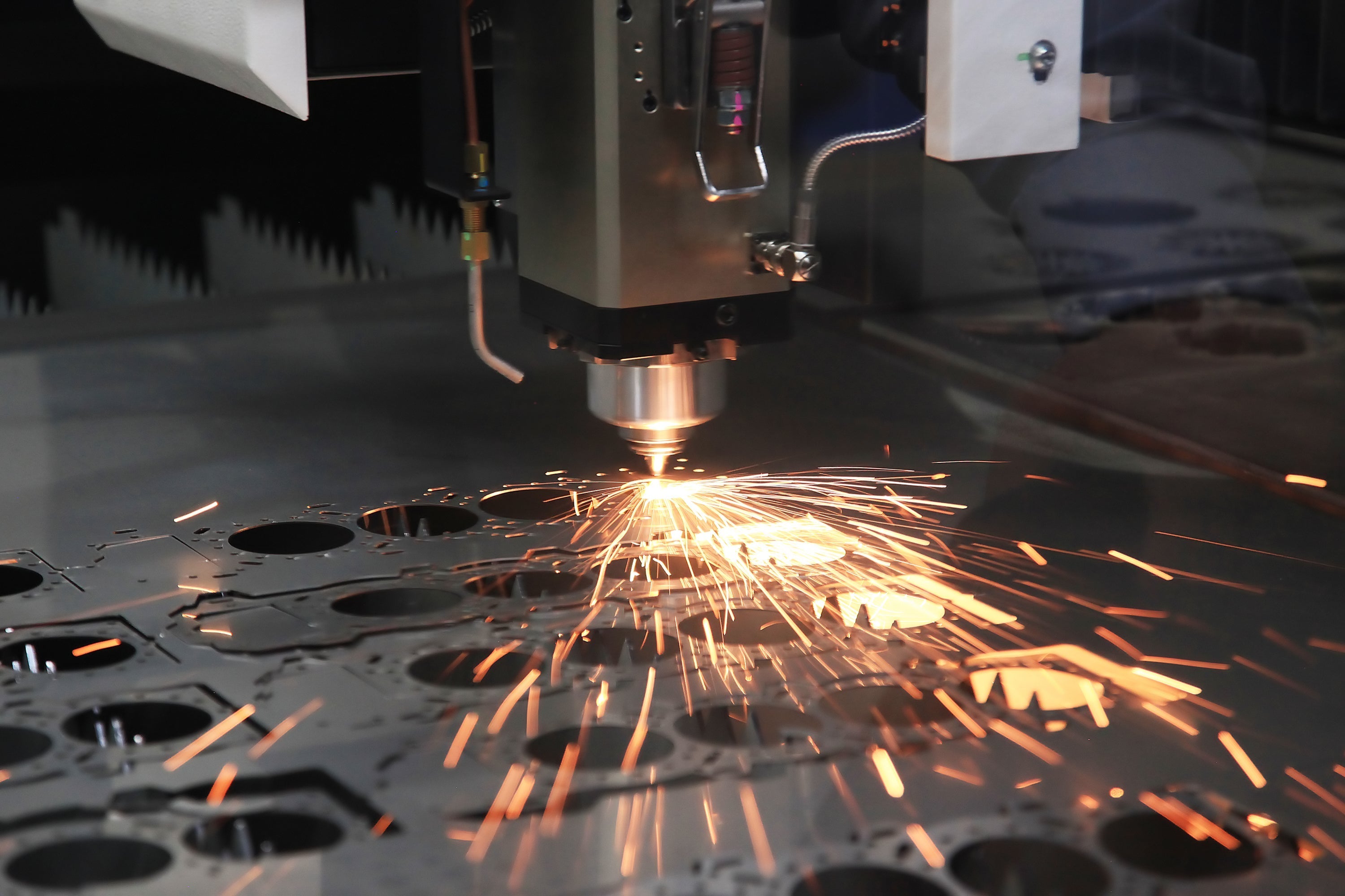 History of Laser Cutting Technology – OMTech